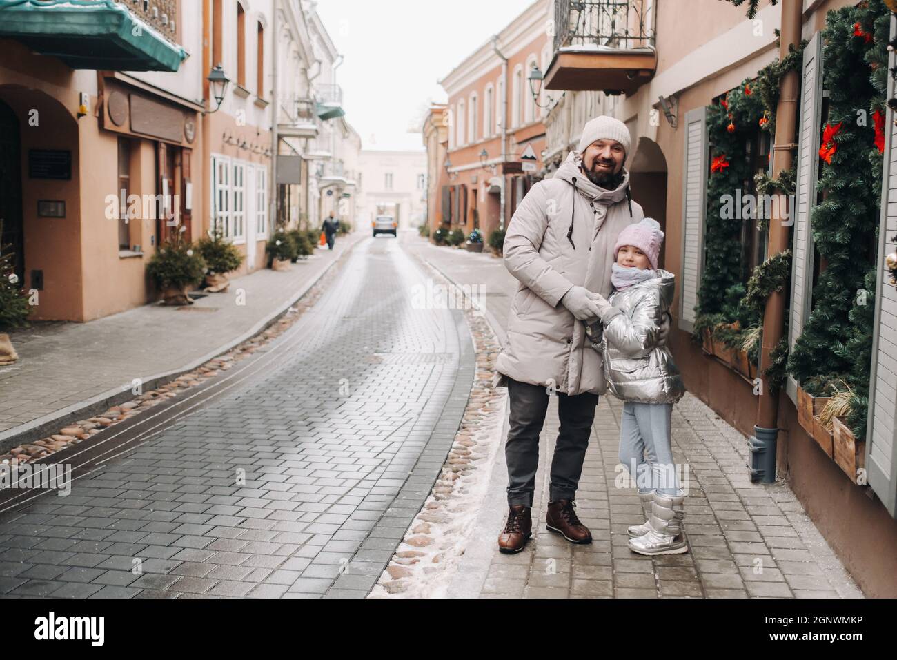 A family walks around the New Year's city of Vilnius.Lithuania Stock ...