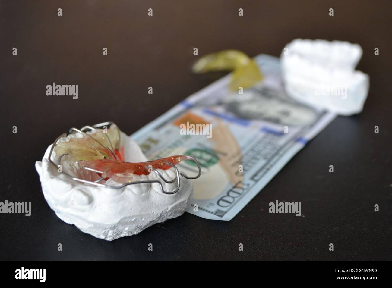 Money bills and teeth hi-res stock photography and images - Alamy
