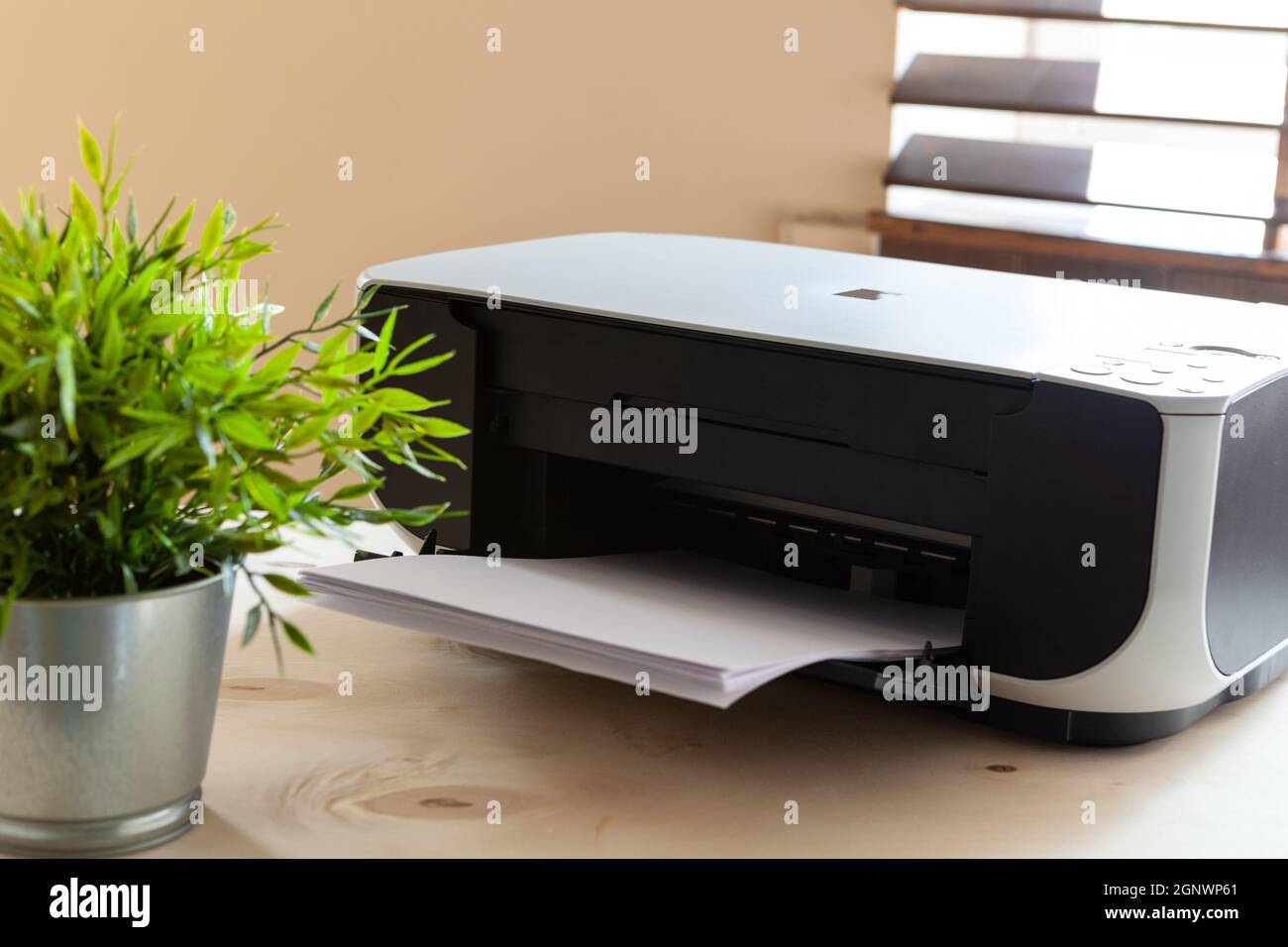 Close up of an office table with printer on it Stock Photo - Alamy