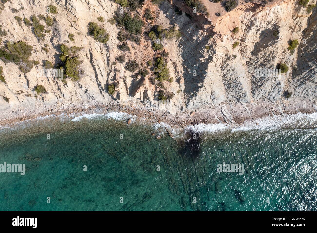 Aerial photo of the Spanish island of Ibiza showing the beautiful beach ...