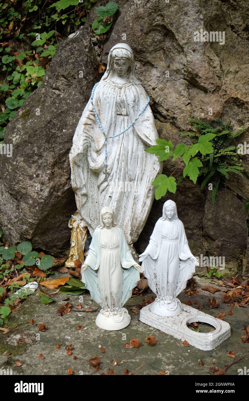 Statues of Our Lady in a small roadside shrine Stock Photo - Alamy