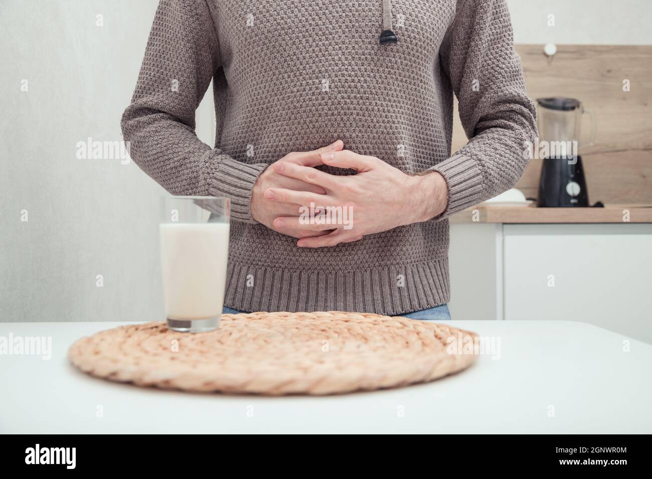 Man feels bad, lactose intolerance. Dairy intolerant person. Health ...