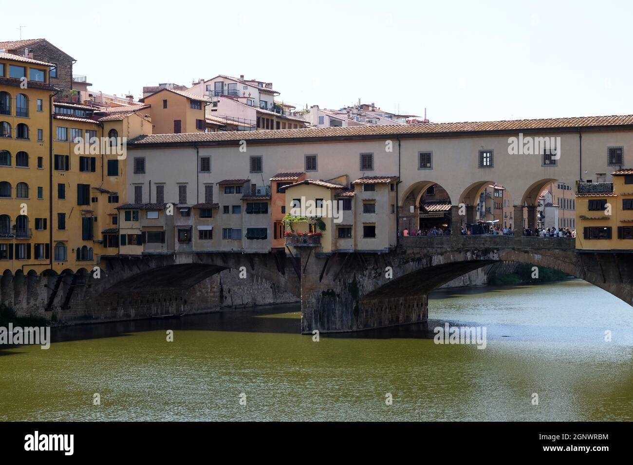 Medieval stone bridge Ponte Vecchio and the Arno Rive in Florence ...