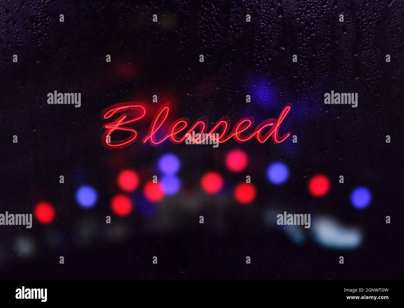 Vintage Neon Blessed Sign in Rainy Window Stock Photo - Alamy