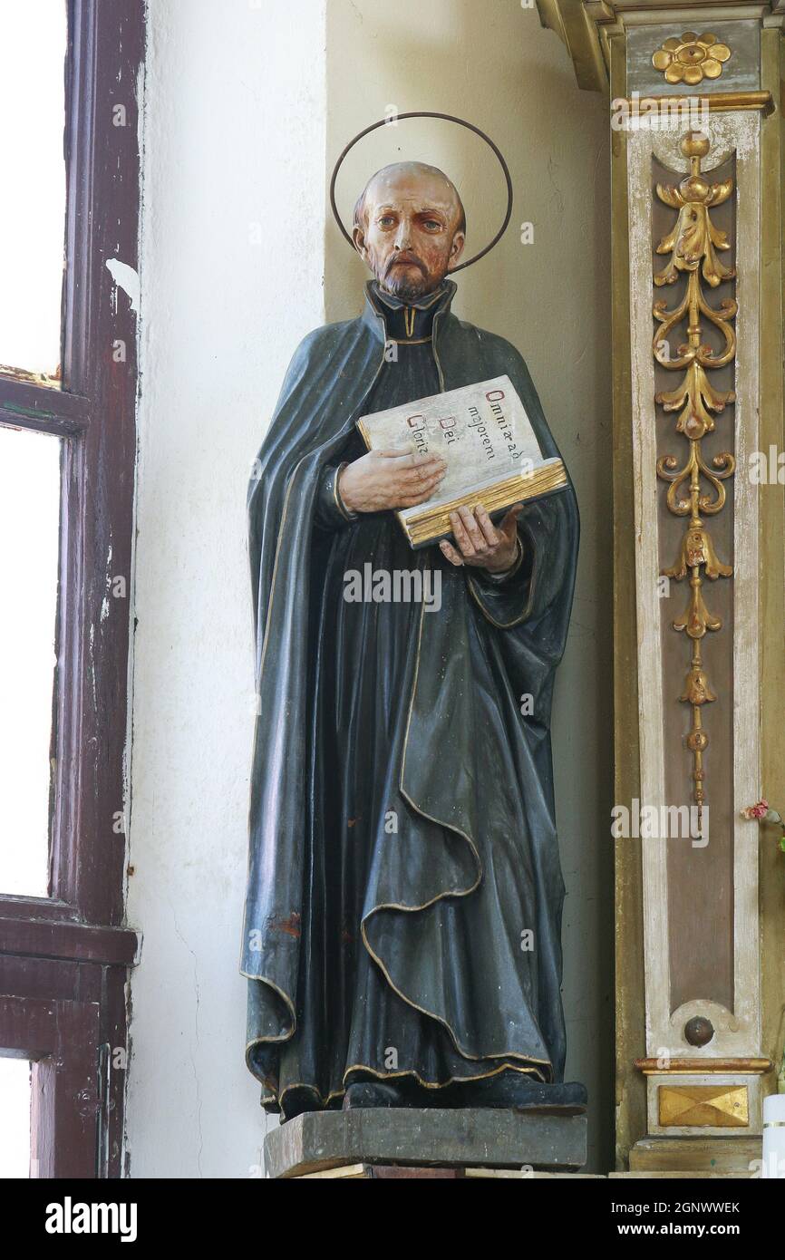 Saint Ignatius statue on the altar of the Sacred Heart of Jesus in the ...