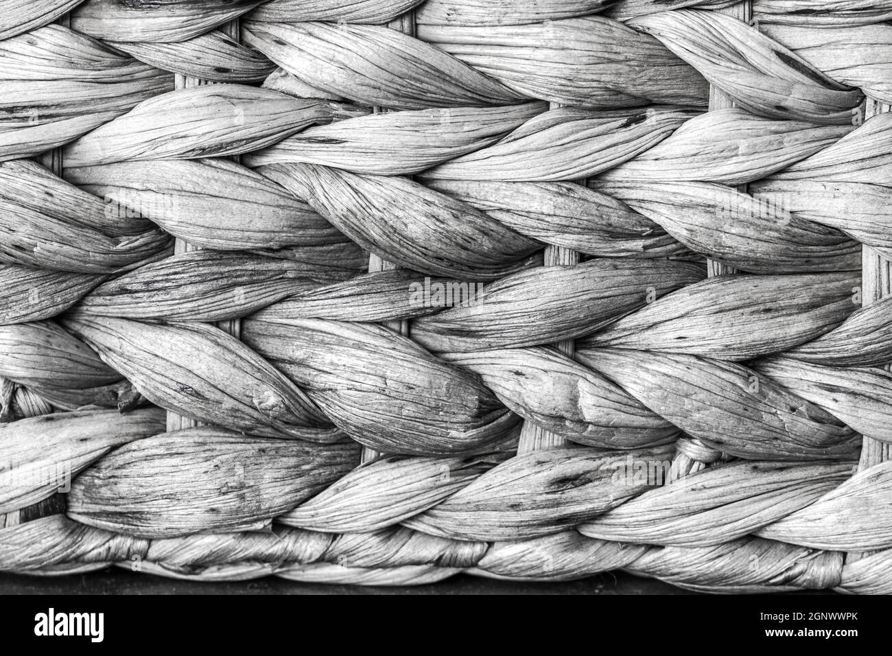 Natural basket made of reed for background Stock Photo - Alamy