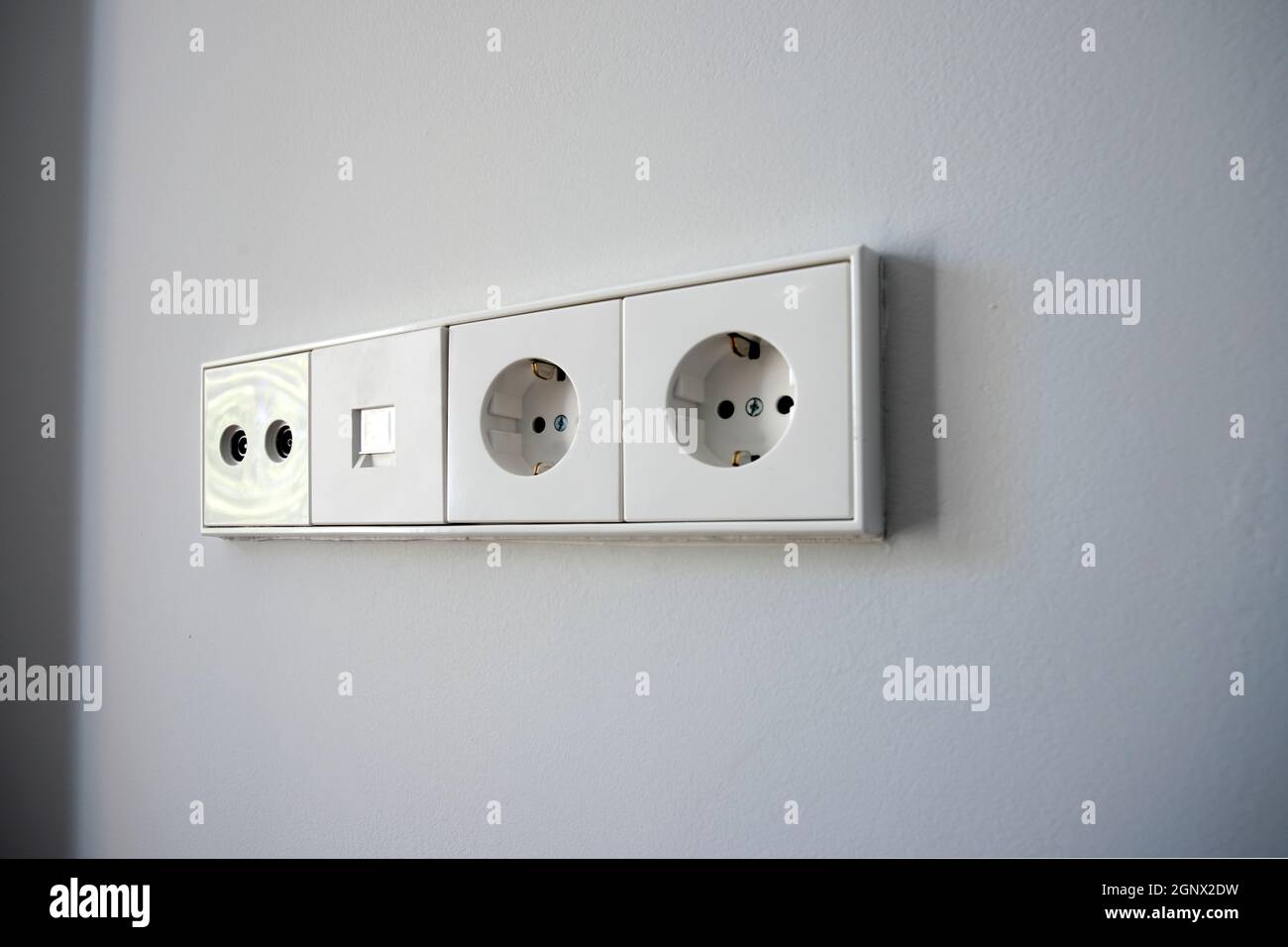 European socket and internet outlet installed on the wall Stock Photo ...