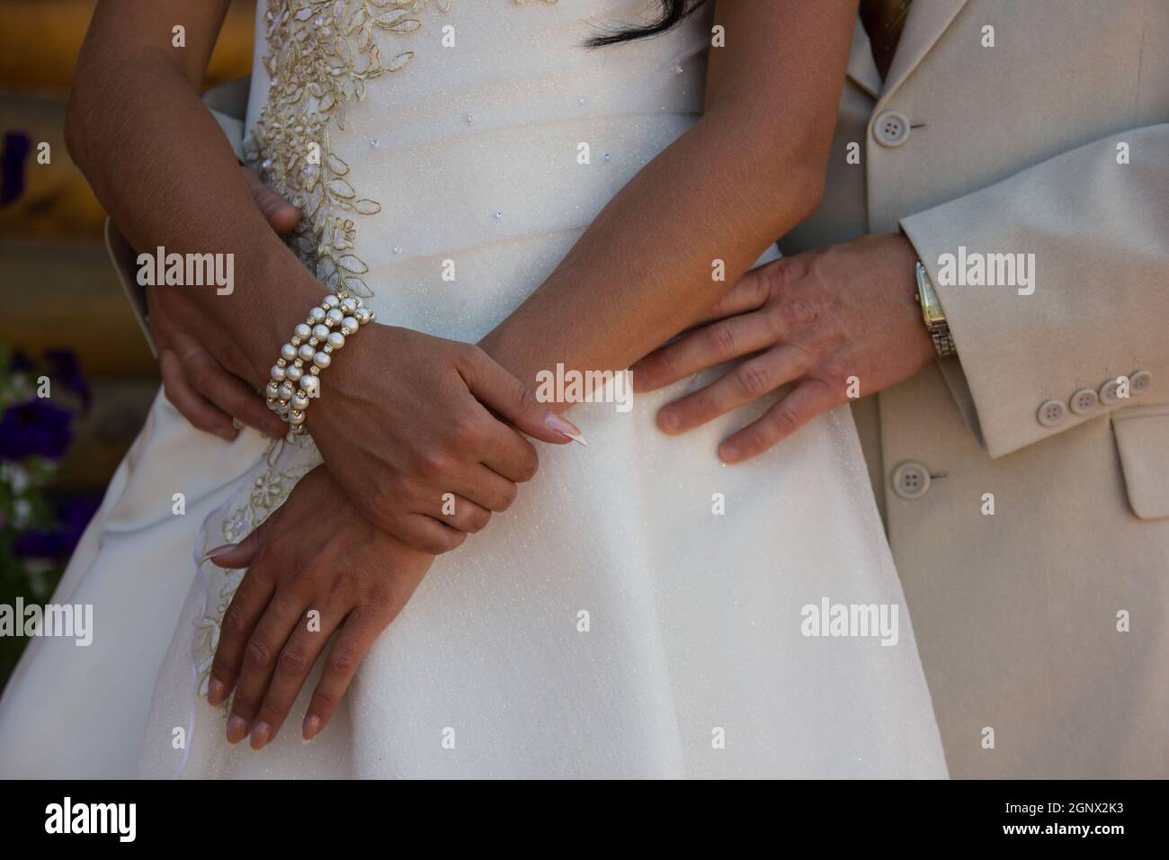 Woman arms around man wedding hi-res stock photography and images - Alamy