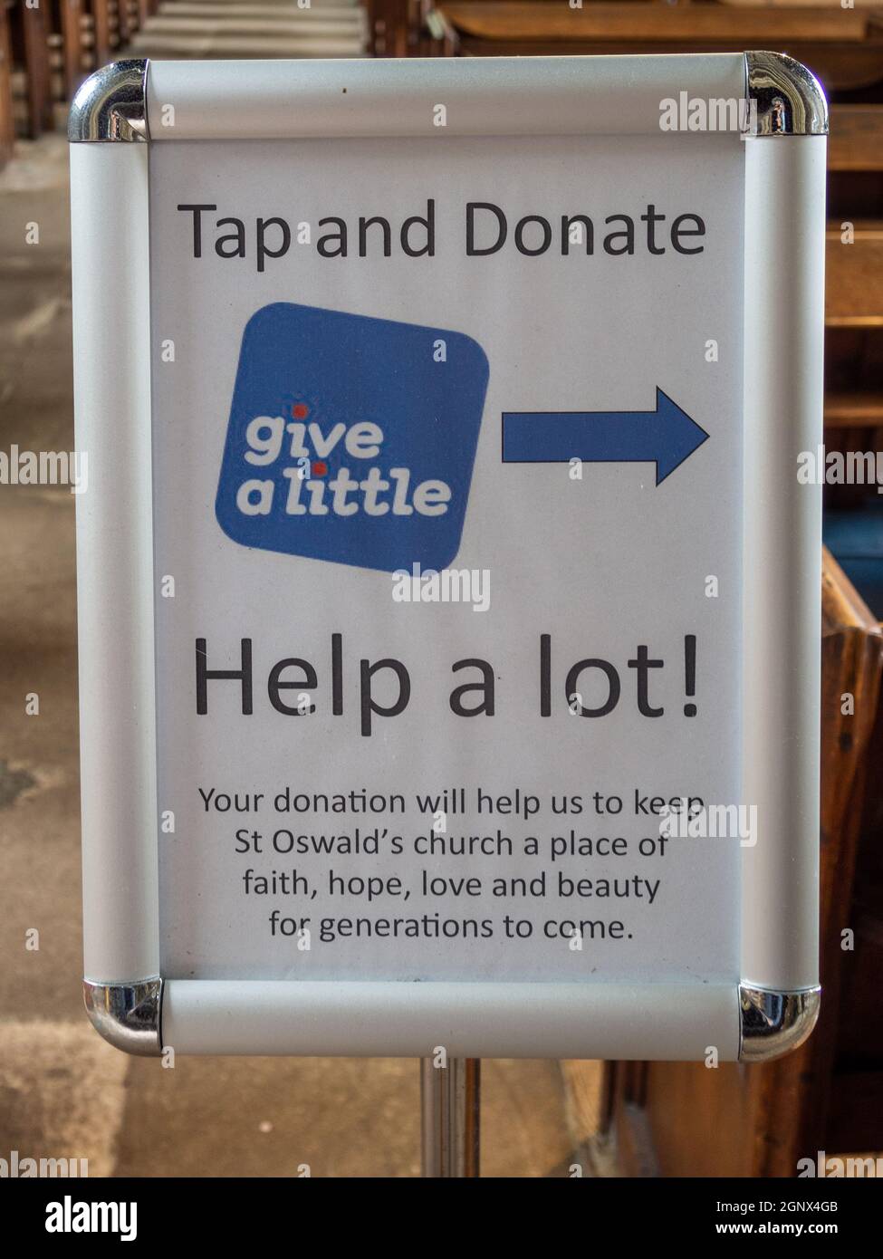 Notice in a UK church for taking contactless charitable donations by ...