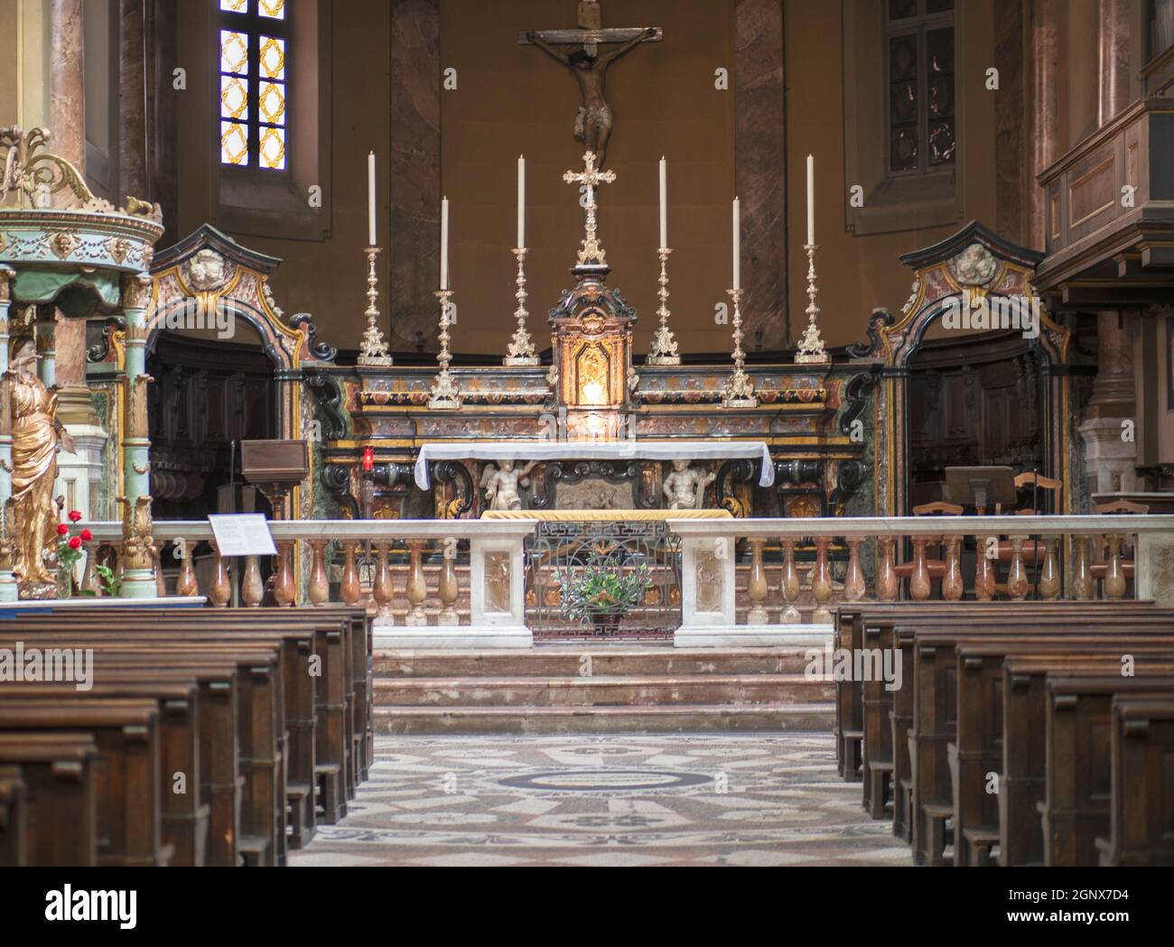 the altar of Romanesque church of the Rosary, interior with rich ...