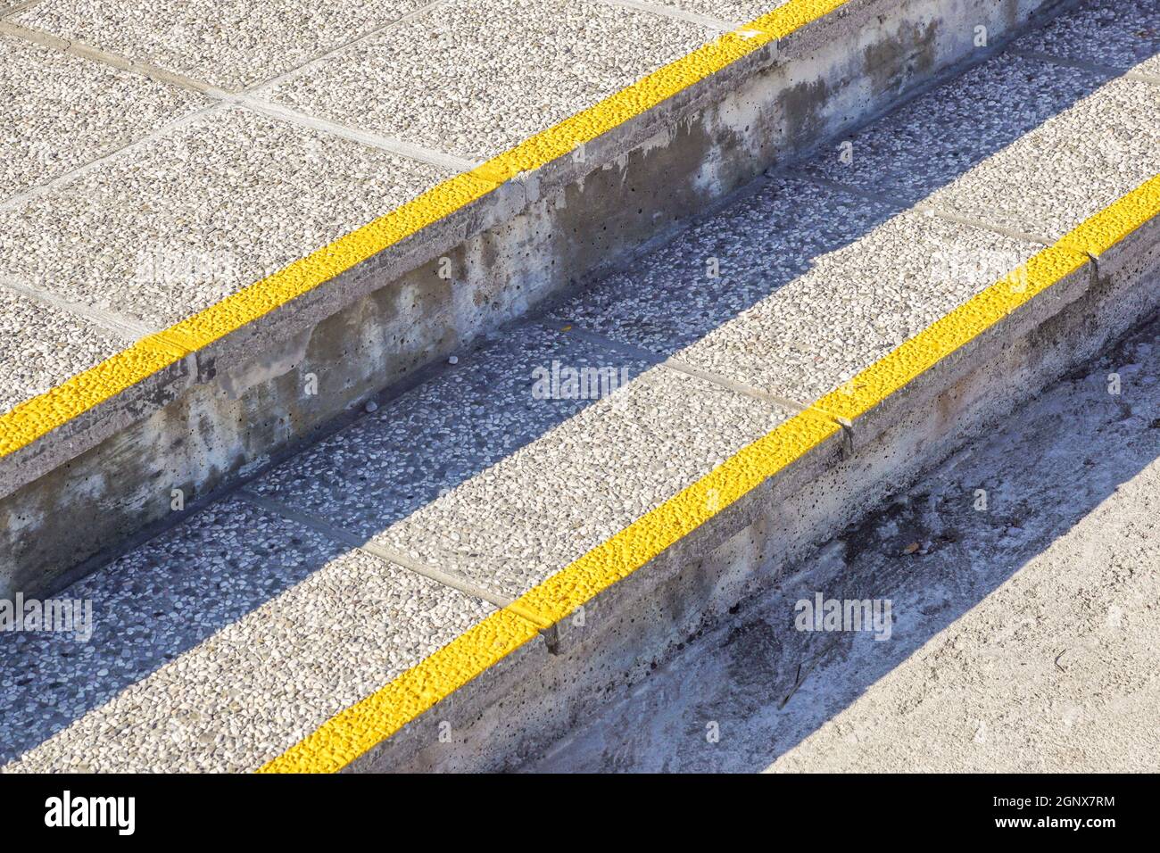 Yellow line at sidewalk with a concrete stairs curbstone Stock Photo ...