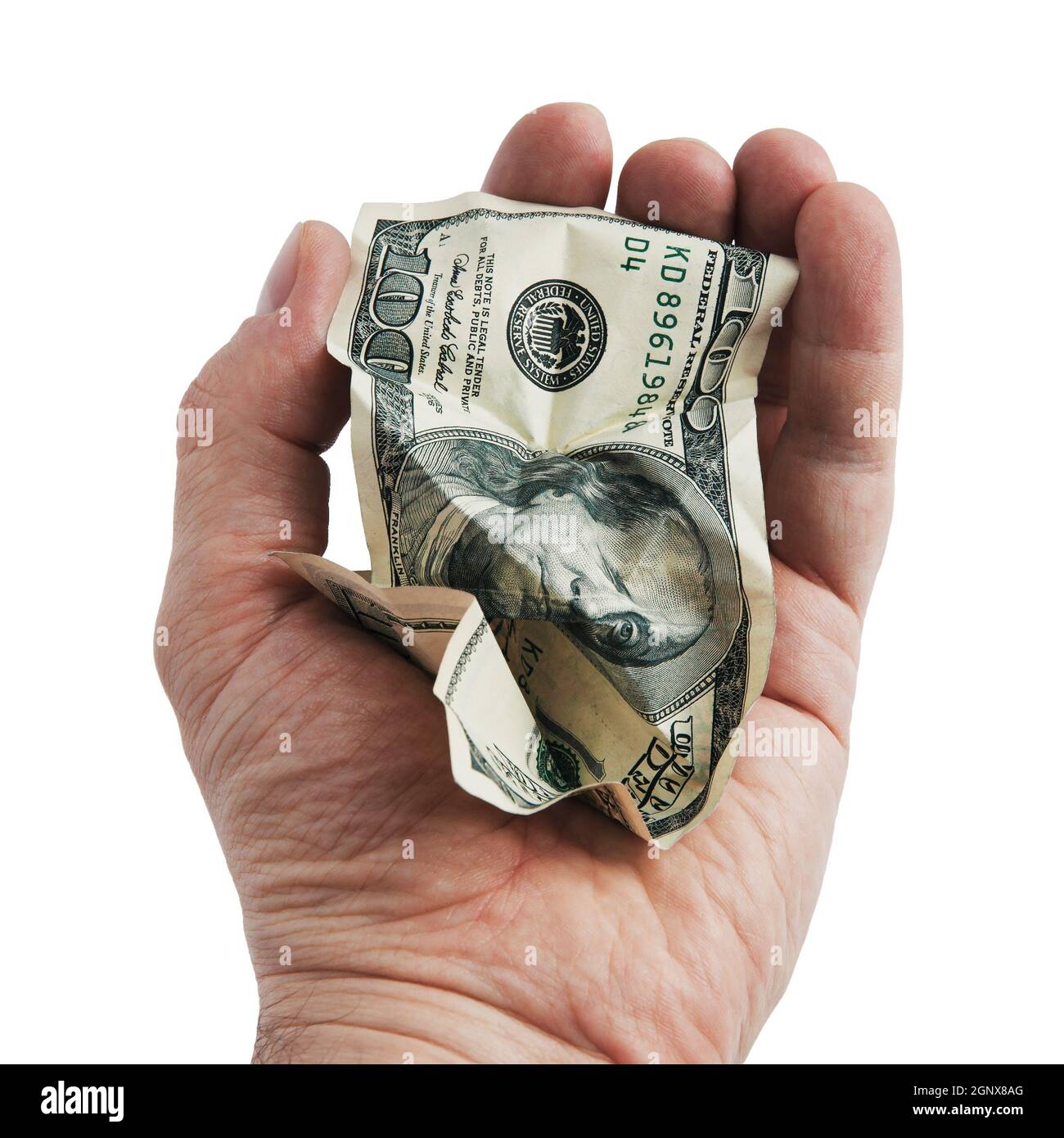 A crumpled hundred-dollar cash bill in his hand. Isolated on a white ...