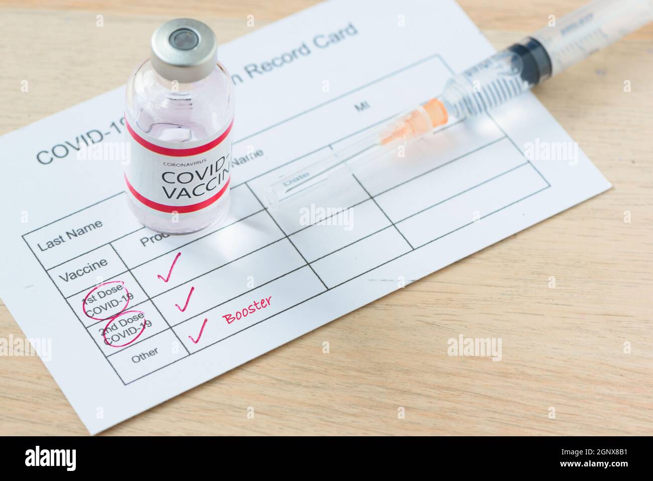 Vaccination record card of booster dose or third injection of covid-19 ...