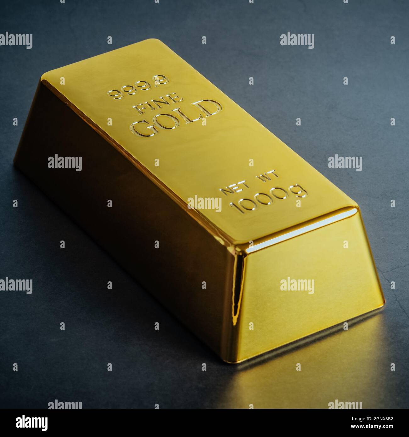 Gold bar ingot bullion on blue background. Located diagonally Stock ...