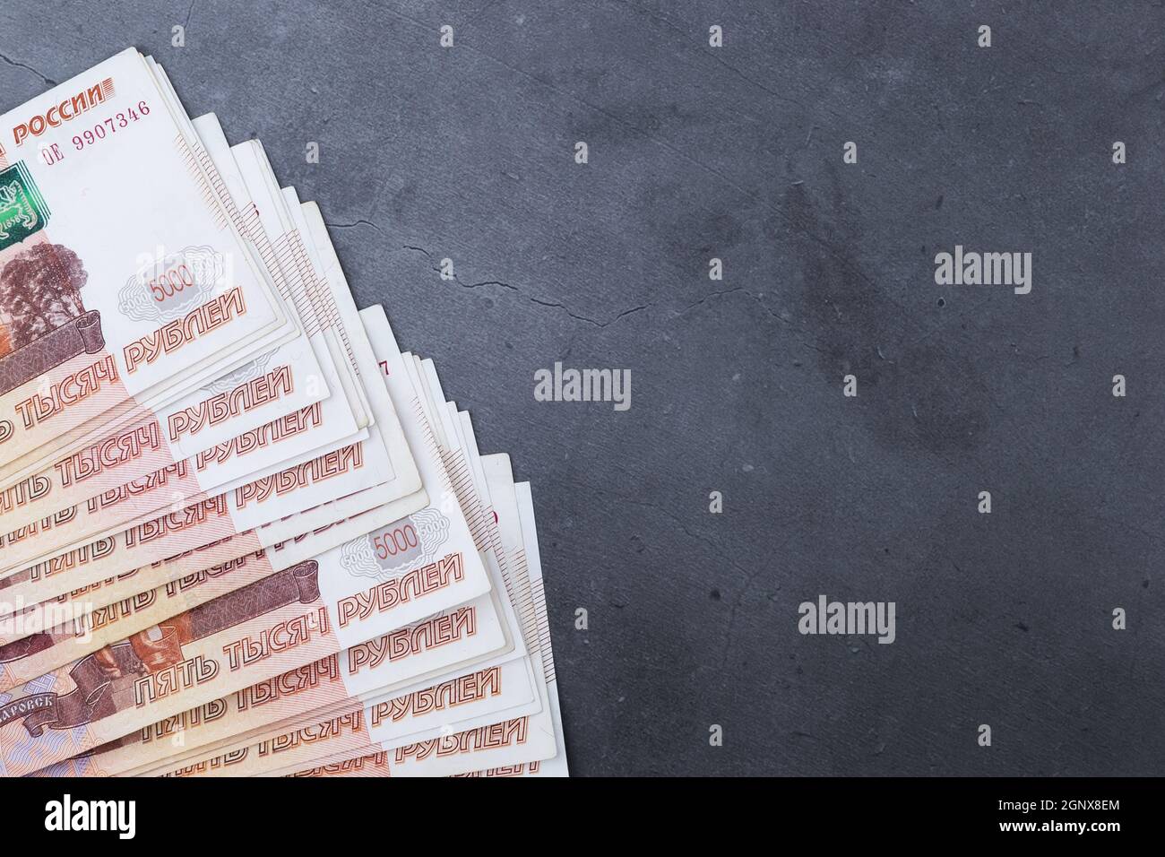 Big stack of Russian money banknotes of five thousand rubles lying on a ...