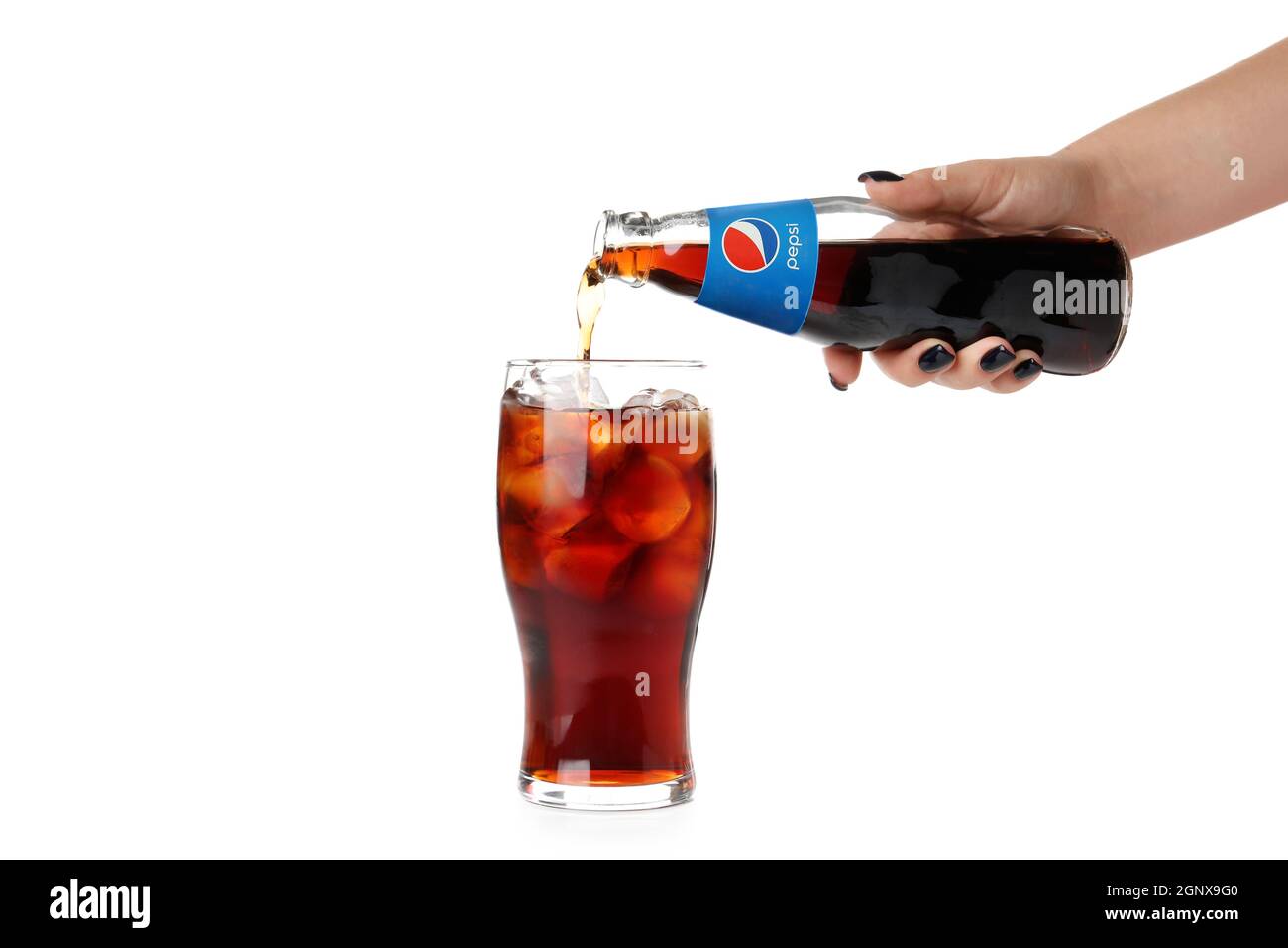 Odessa, Ukraine - September 23, 2021: Female hand pour Pepsi from ...