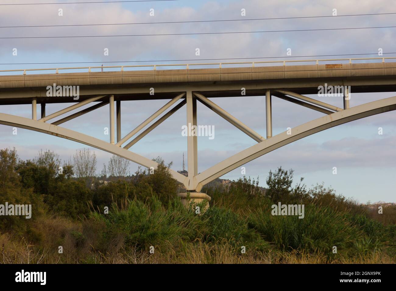 Modern bridge to cross the river Stock Photo - Alamy