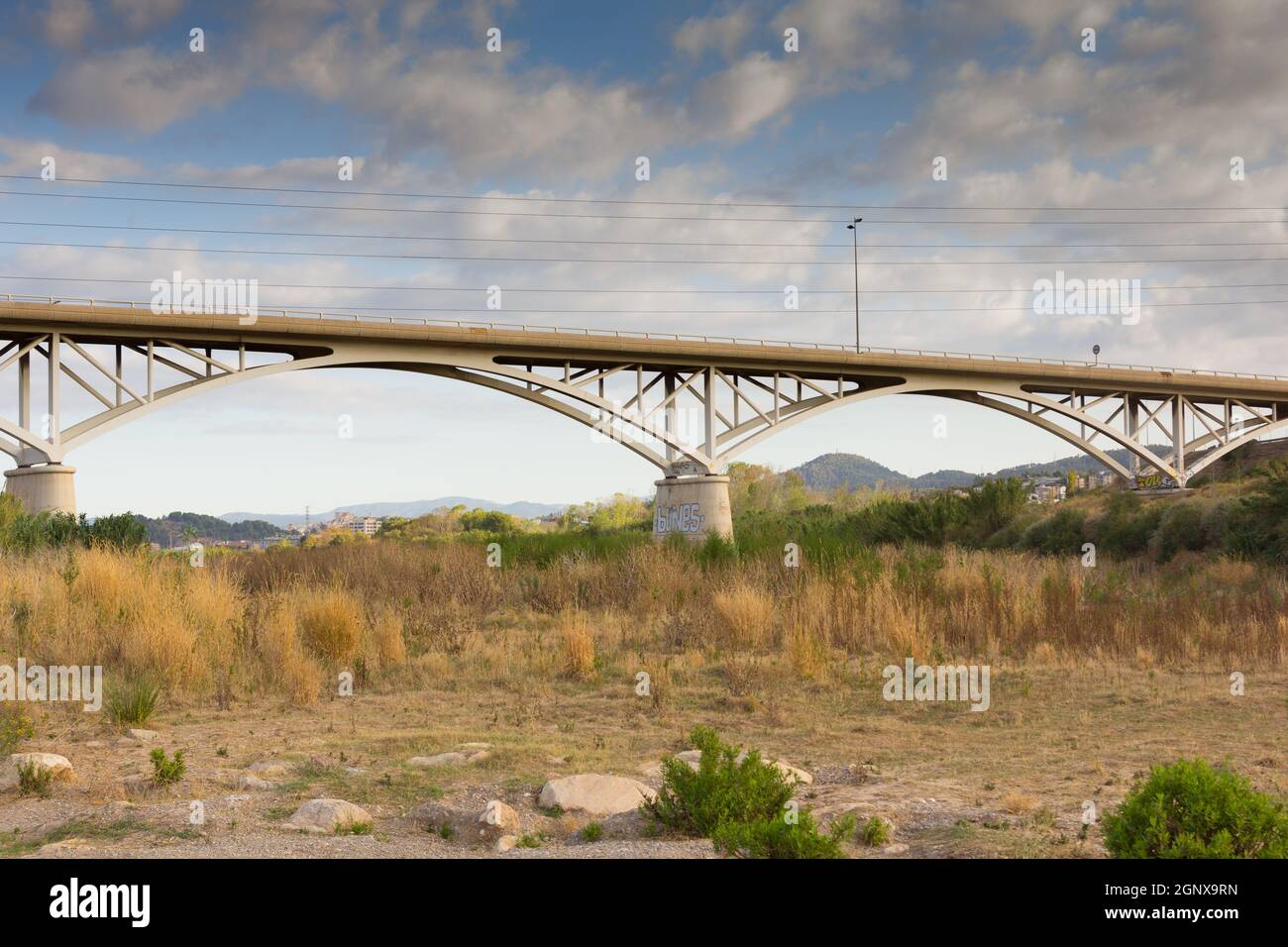 Modern bridge to cross the river Stock Photo - Alamy