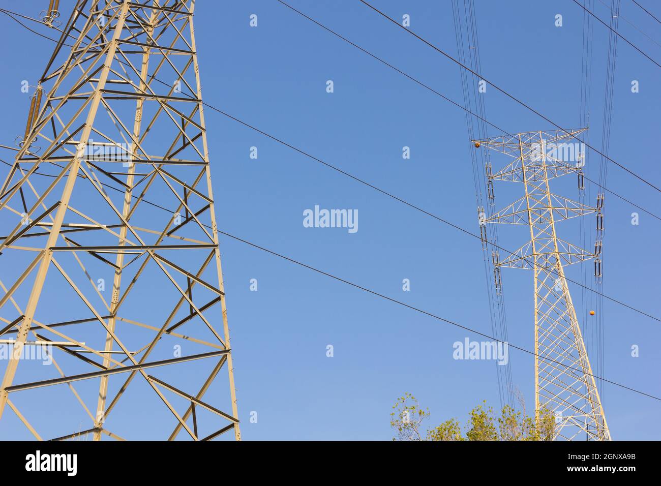 Electric towers in nature, transporting electric power through the ...