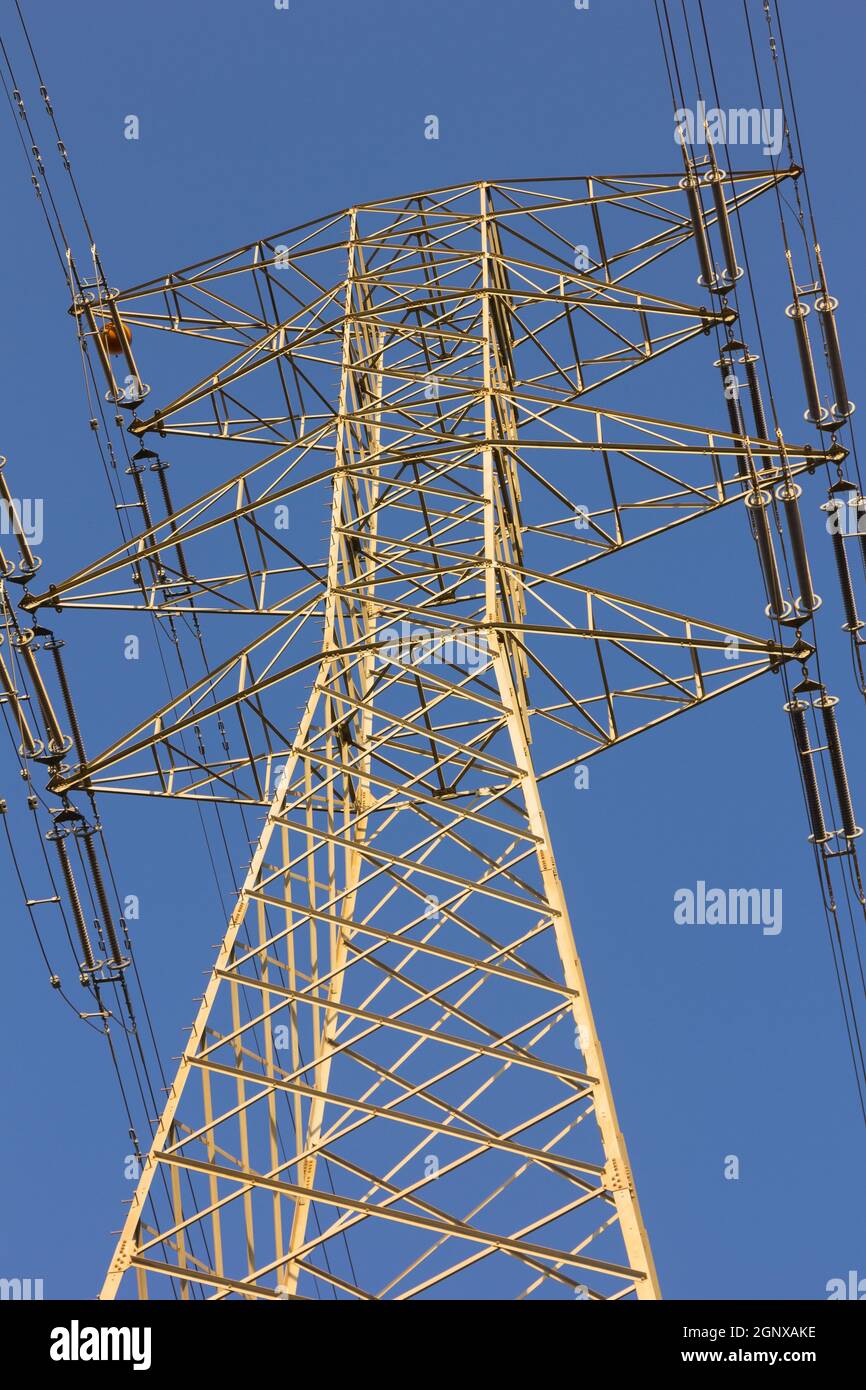 Electric towers in nature, transporting electric power through the ...