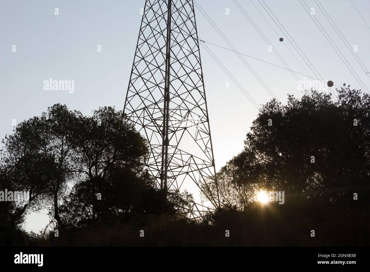 Electric towers in nature, transporting electric power through the ...