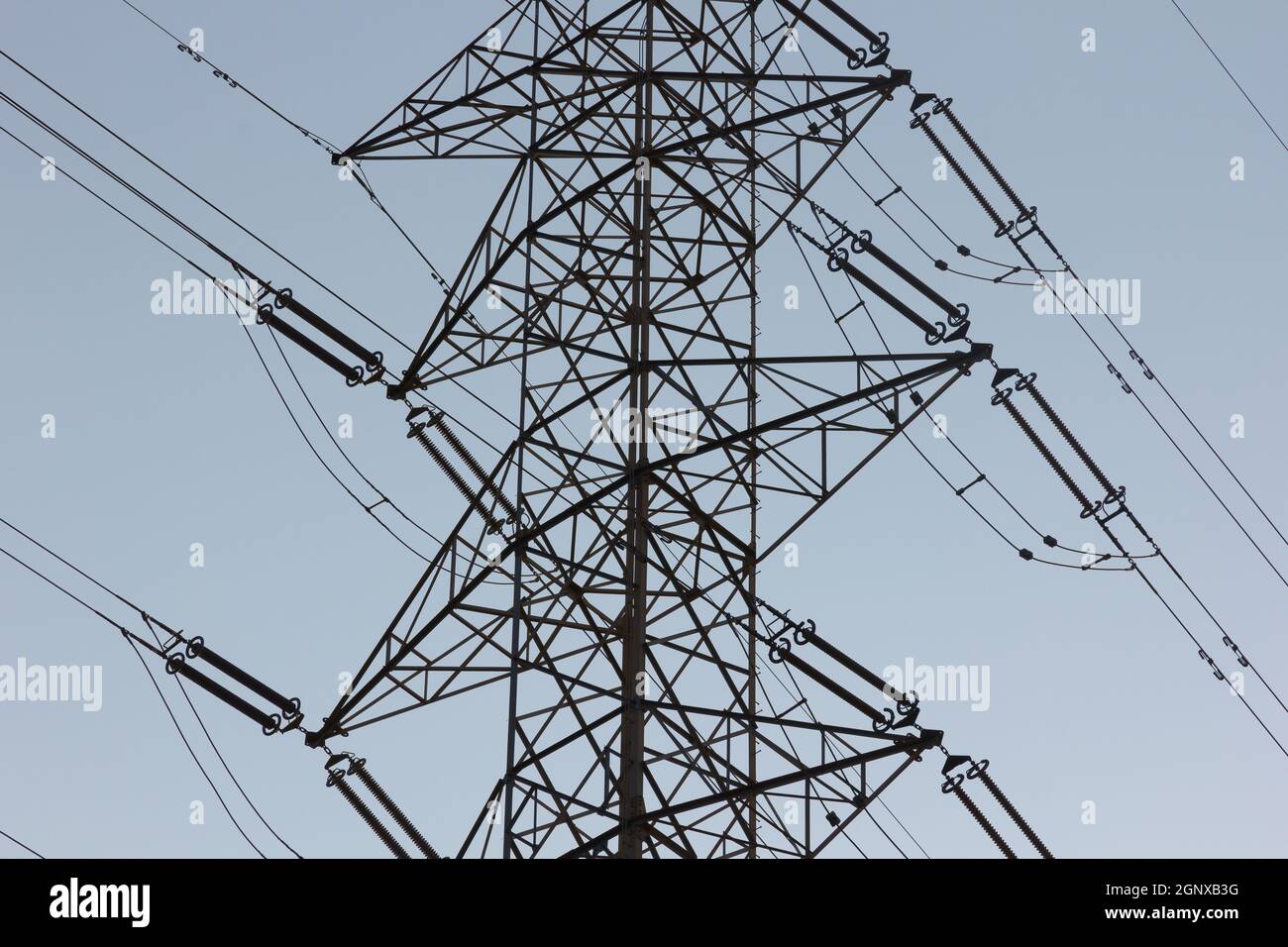 Electric towers in nature, transporting electric power through the ...