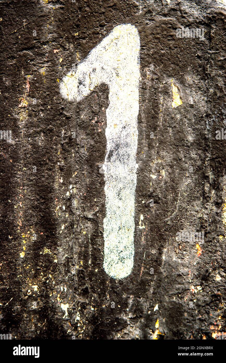 Number 1 on a wall Stock Photo - Alamy