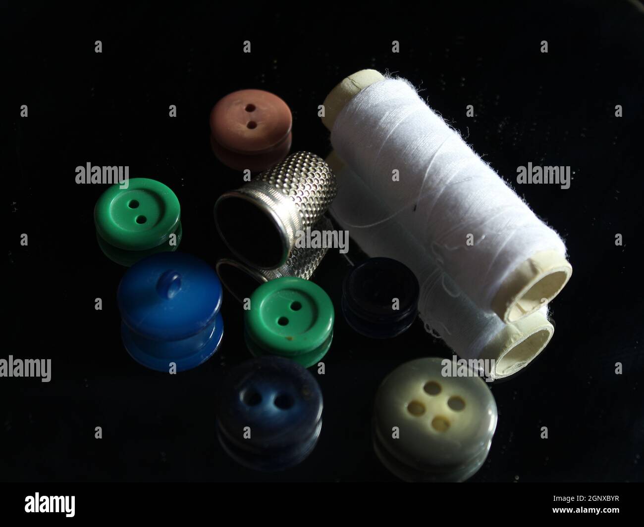 Sewing Needle thread scissors thimble tailor buttons Stock Photo - Alamy