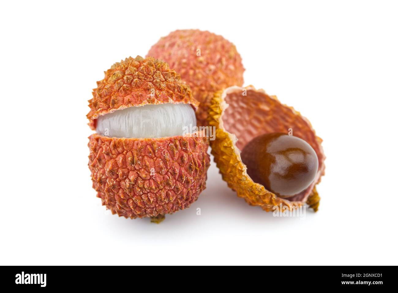 Lychee fruit opened and showing seed isolated on white background Stock ...