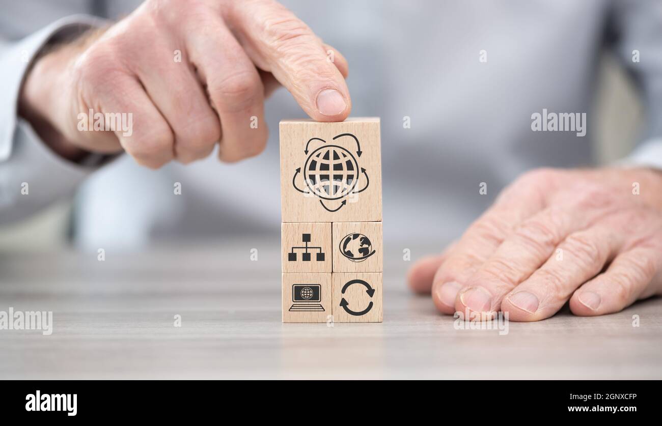 Wooden blocks with symbol of globalization concept Stock Photo - Alamy