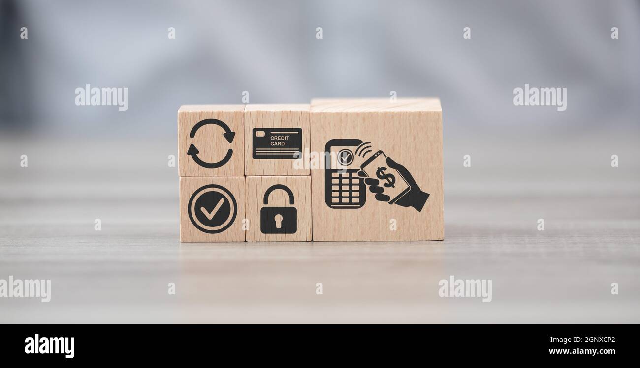 Wooden blocks with symbol of mobile payment concept Stock Photo - Alamy