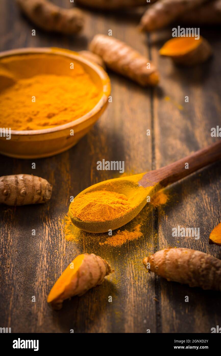 Turmeric root and powder (Curcuma longa) as cooking ingredient on ...