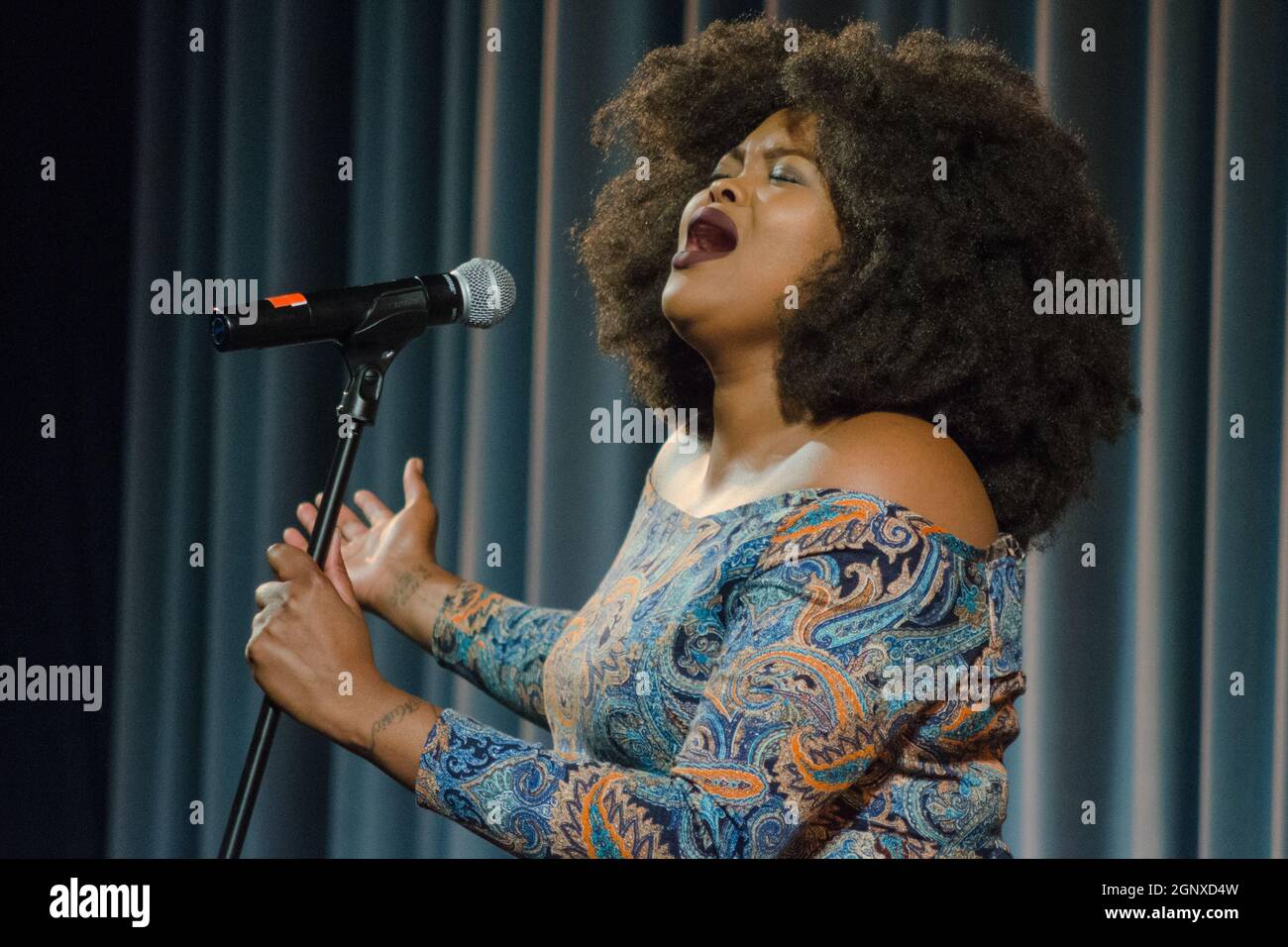 South African singer Buhle Mad performs as part of the acapella group ...