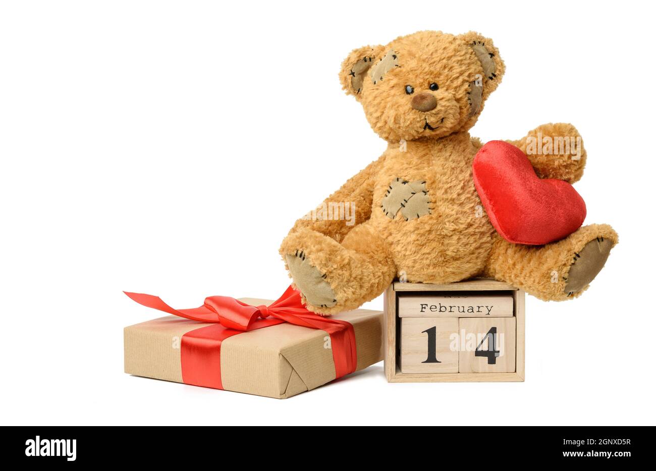 teddy bear and wooden calendar with date 14 february and box with a ...