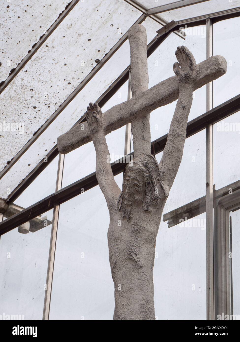 Large crucifix with crucified Jesus Christ made in concrete Stock Photo - Alamy
