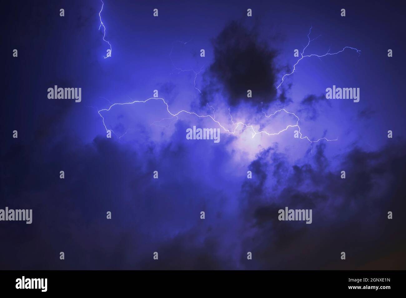 Summer thunderstorm with lightnings in the clouds Stock Photo - Alamy