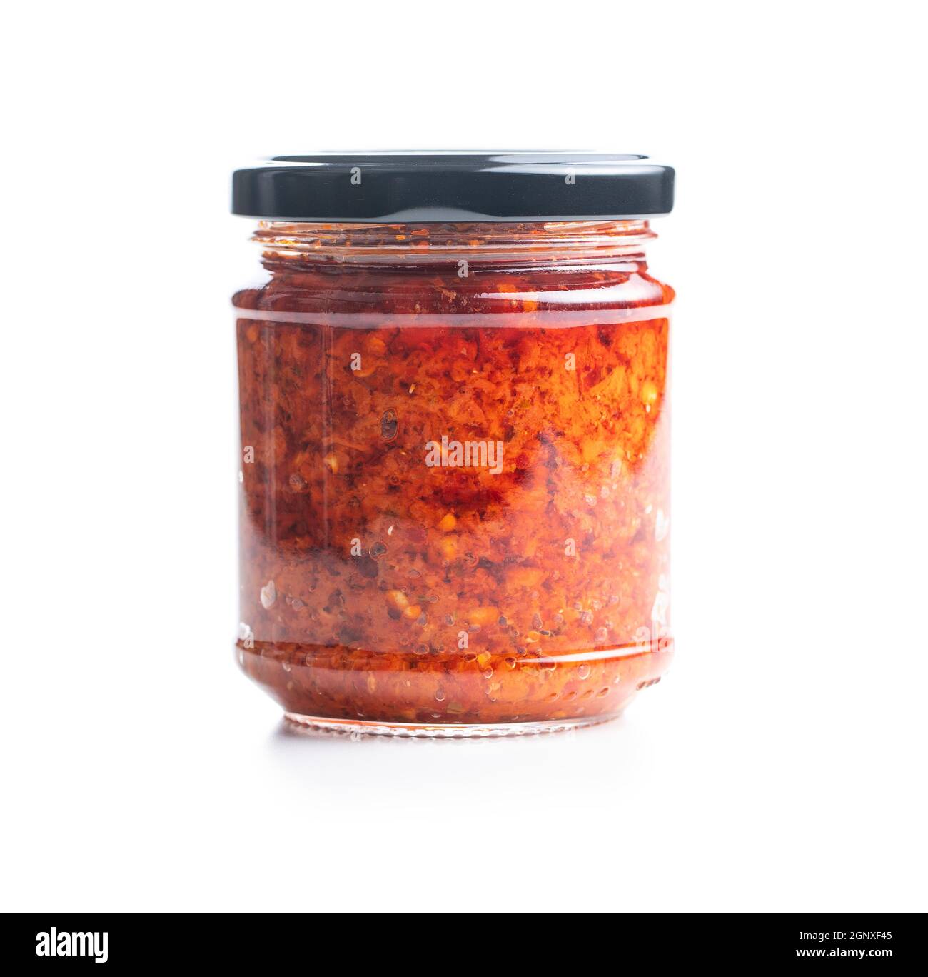 Red hot chili paste in jar isolated on white background Stock Photo - Alamy