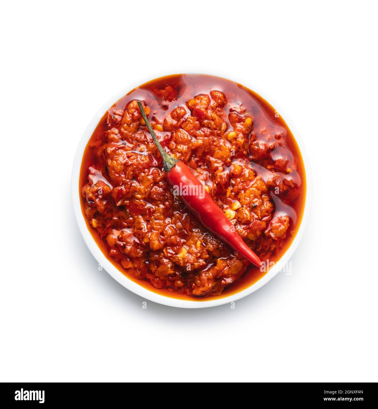 Red hot chili paste in bowl isolated on white background Stock Photo ...