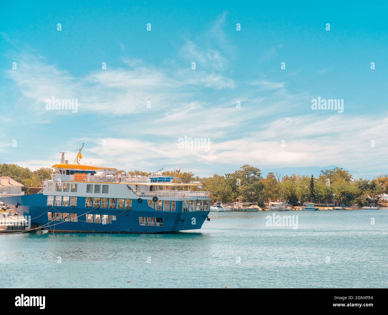 Blue ferry boat in the Mediterranean docked at marina Stock Photo - Alamy