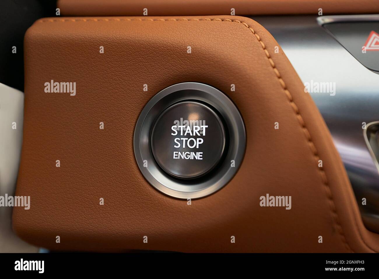 Starting the engine of a car with button Stock Photo - Alamy