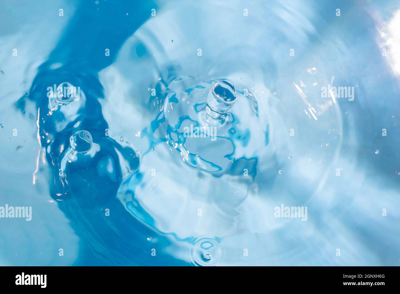 Abstract an outbreak of water. Splash of water close-up. Frozen water ...