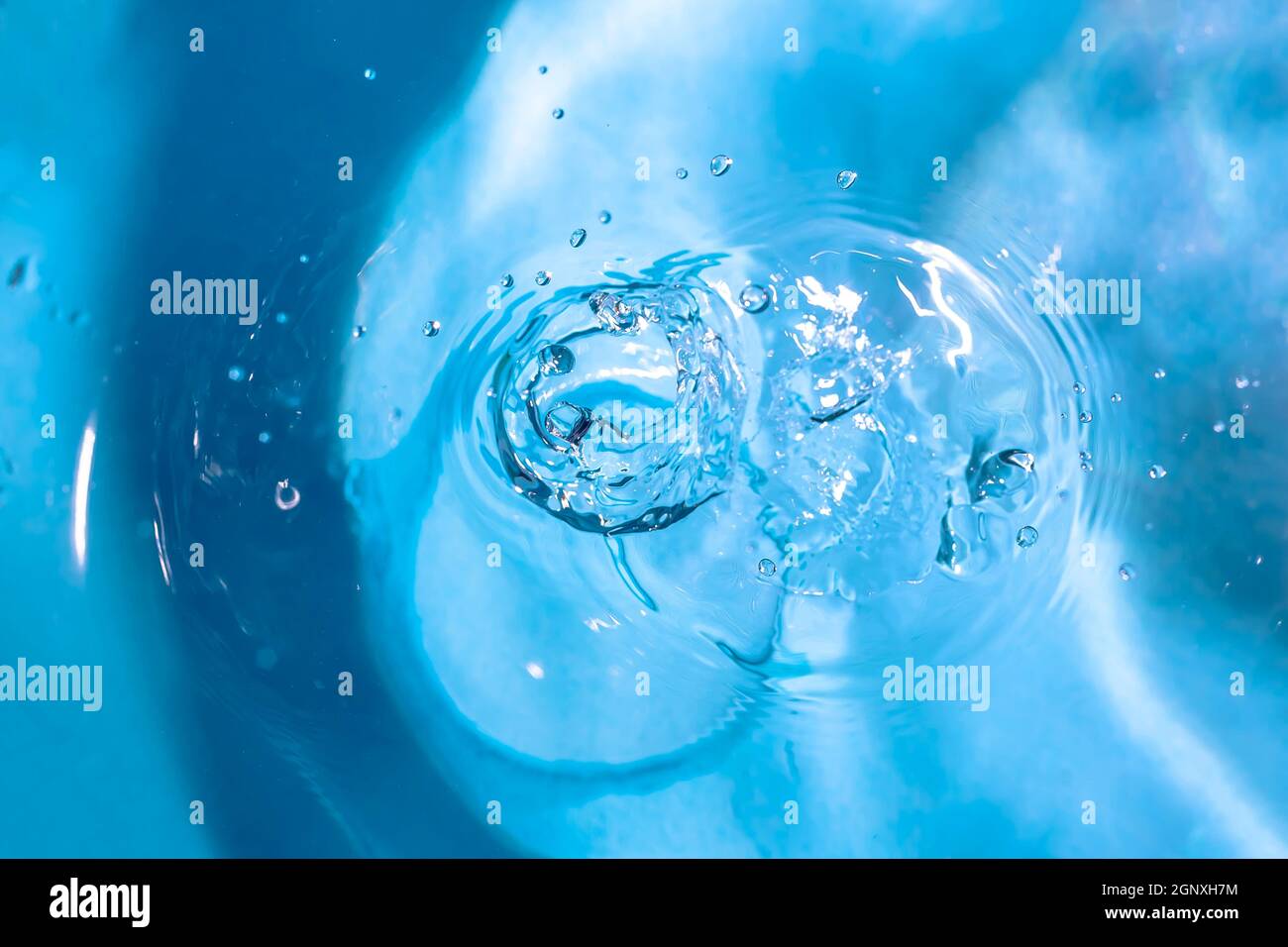 Water splash backgrounds close-up.Crown of blue water.Water drop.Frozen ...
