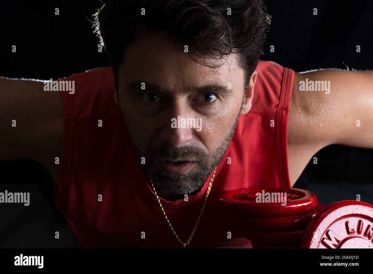 Sweaty Athlete Making Physical Exertion With Weights Stock Photo Alamy sweaty-athlete-making-physical-exertion-with-weights-stock-photo-alamy