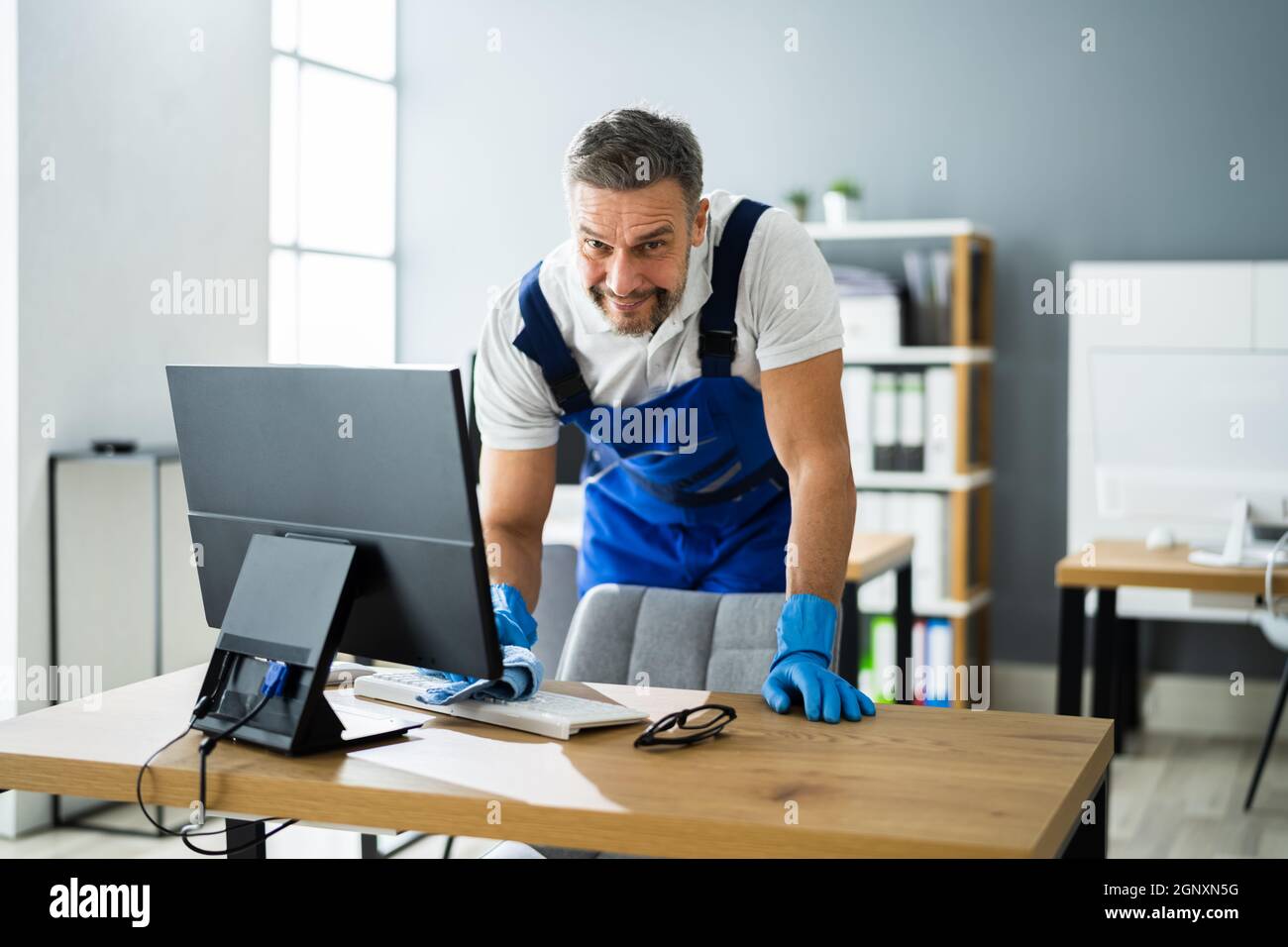 Professional Workplace Janitor Service. Office Desk Cleaning Stock ...