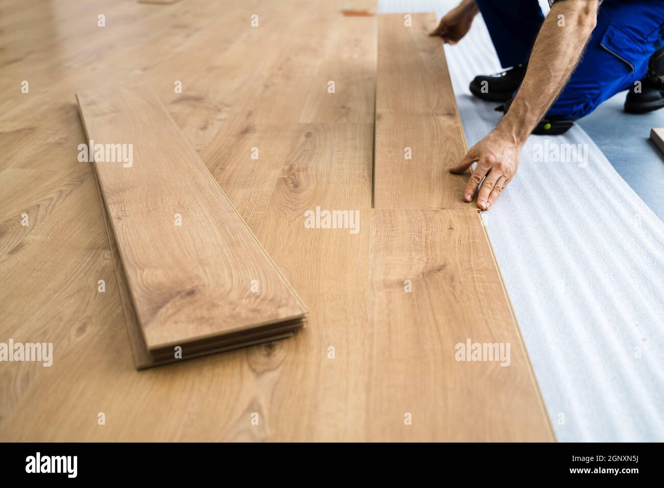 Worker Installing Home Floor. Carpenter Laying Laminate Flooring Stock ...