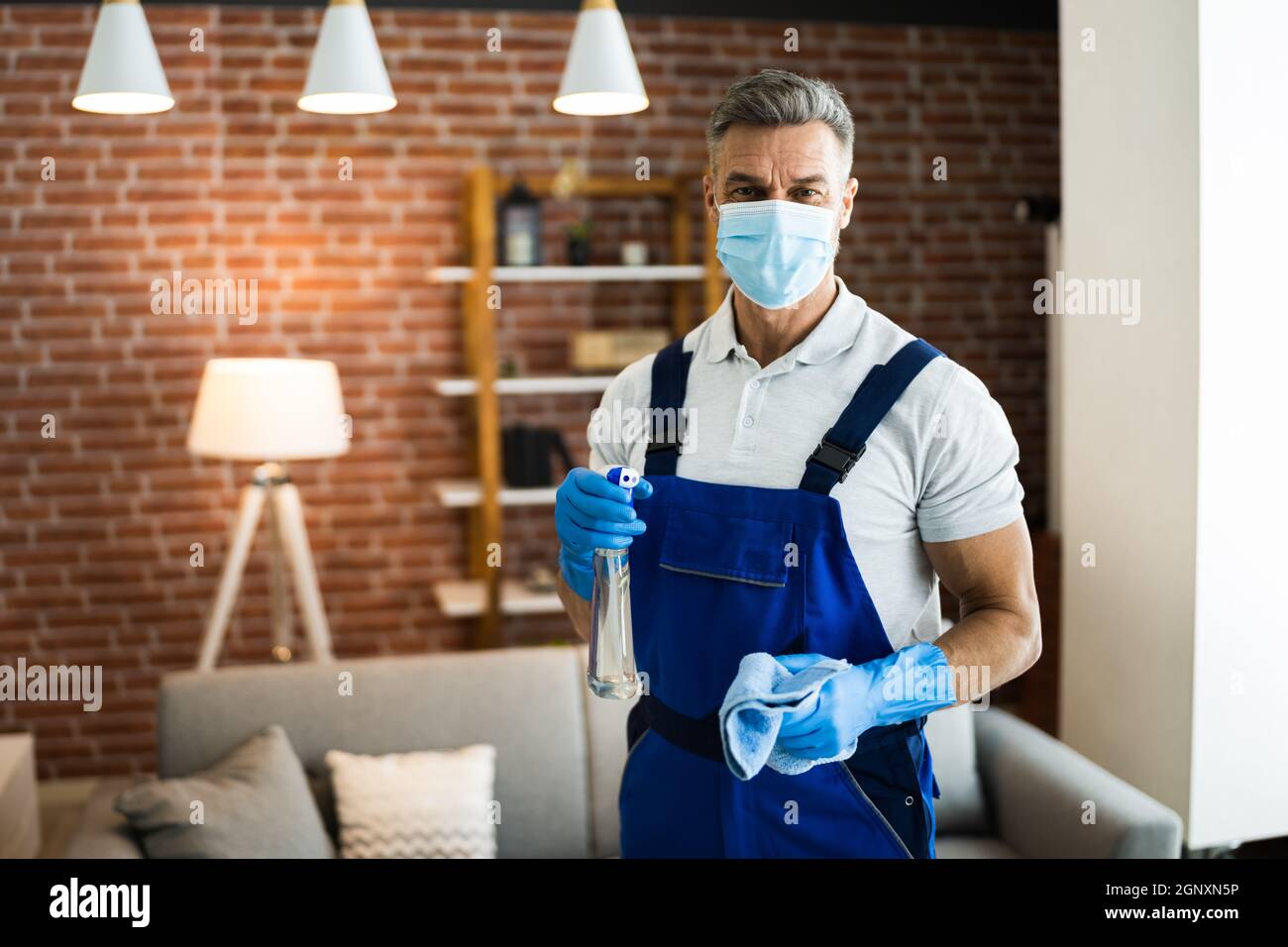 Home Cleaning Janitor Service In Face Mask Stock Photo - Alamy