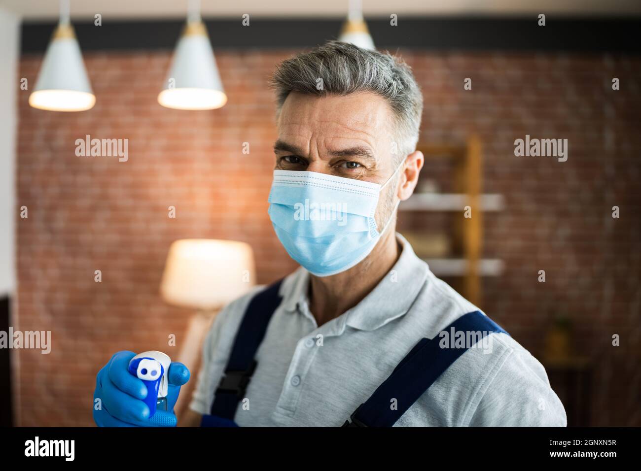 Home Cleaning Janitor Service In Face Mask Stock Photo - Alamy