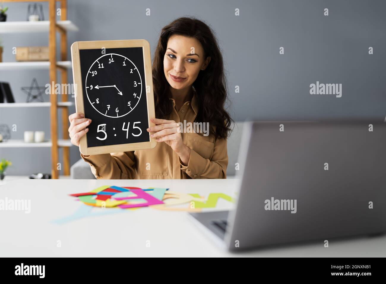 Elementary School Teacher Woman In Video Call Explaining Stock Photo ...
