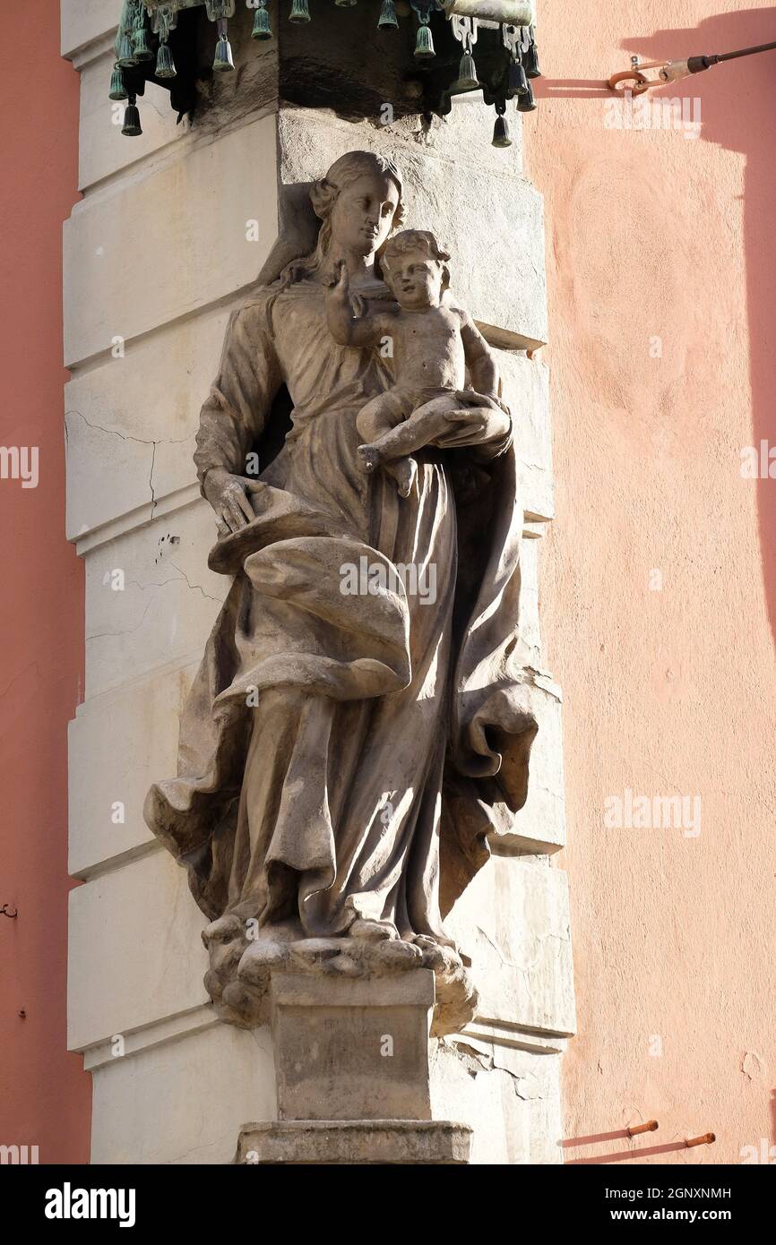 Church tower with statue of mary and baby jesus hi-res stock ...