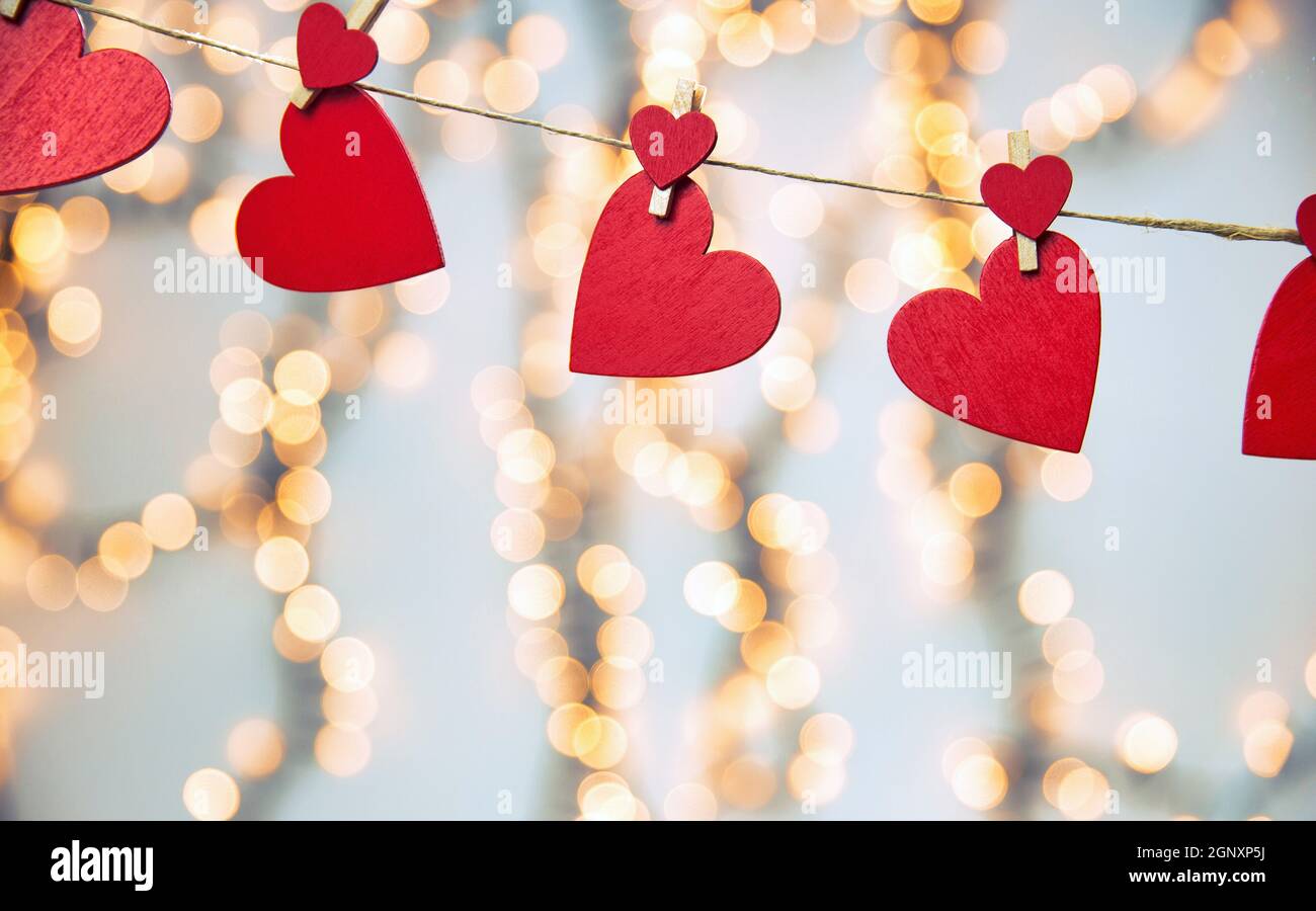 Happy Valentine day background with red hearts hang with clothespin on ...